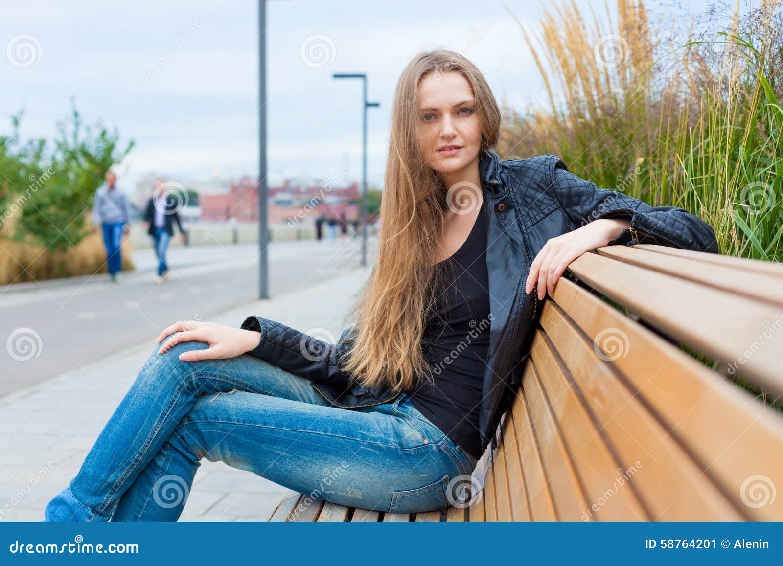 Portrait Of A Beautiful Girl In The Park On The Bench Close Up Stock