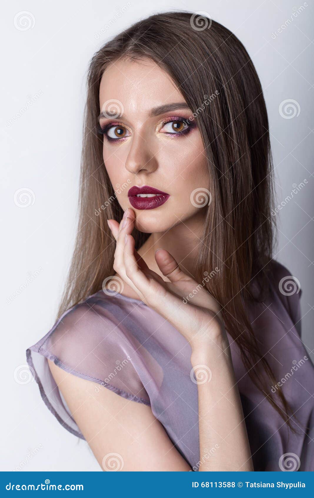 Portrait Of A Beautiful Girl With A Sweet Delicate Burgundy Lips And