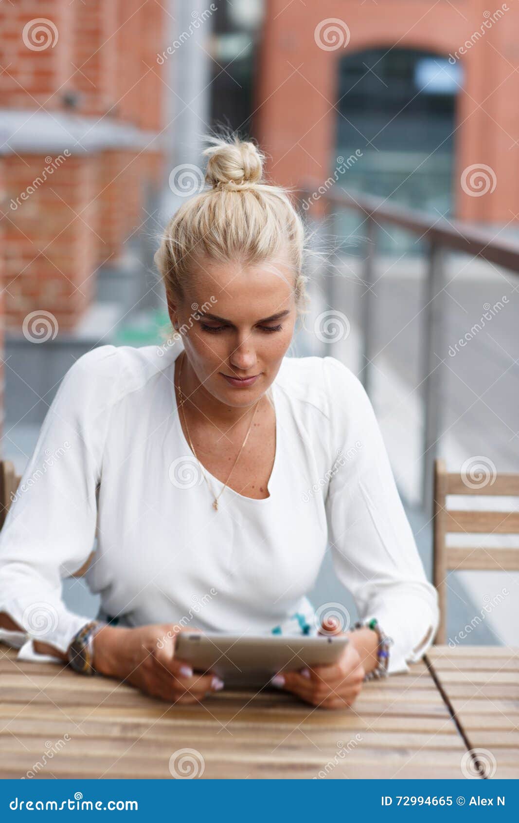 Portrait of a Beautiful Girl at the Table with Tablet Stock Image ...