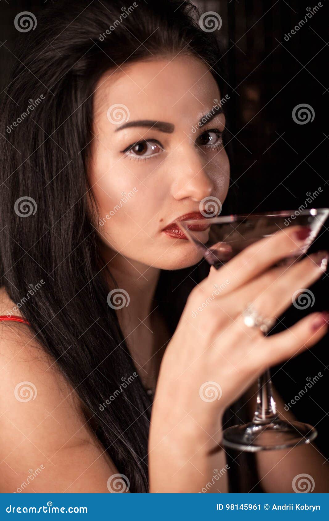 Portrait of Beautiful Lady Drinking Cocktail in a Bar. Stock Image ...