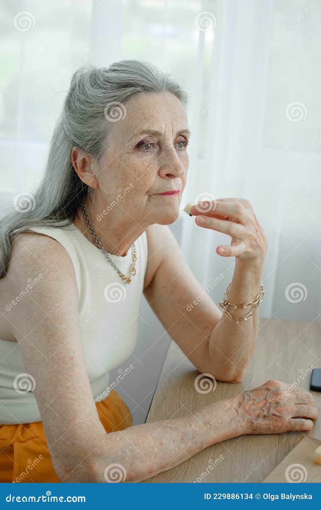 Portrait Of Beautiful Old Grandmother With Grey Hair And Face With