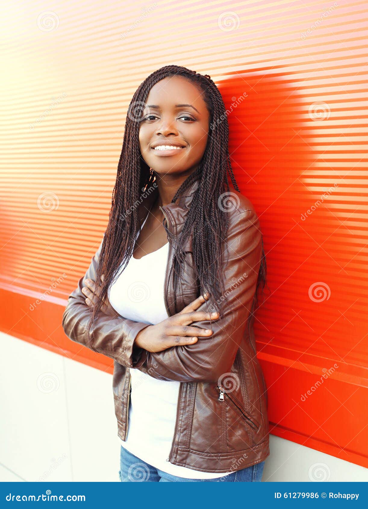 Portrait Beautiful Smiling African Woman Wearing A Leather Jacket Stock