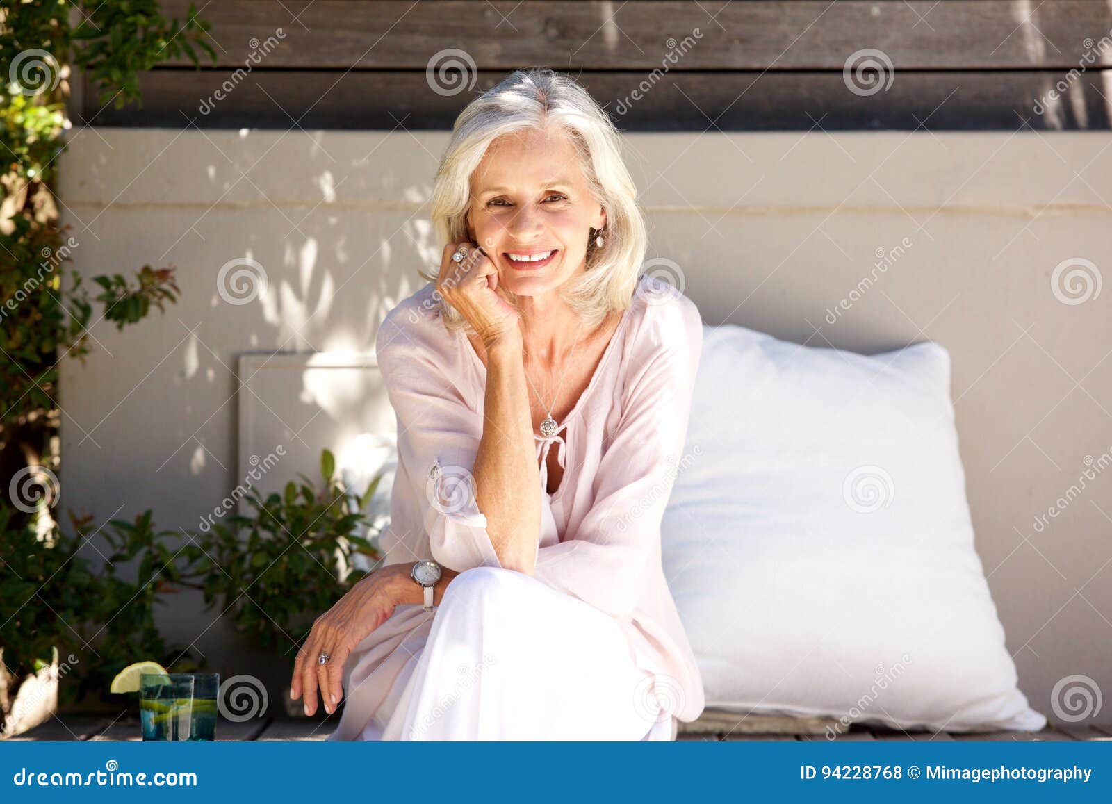 Beautiful Smiling Older Lady Sitting Outside Stock Photo - Image of ...