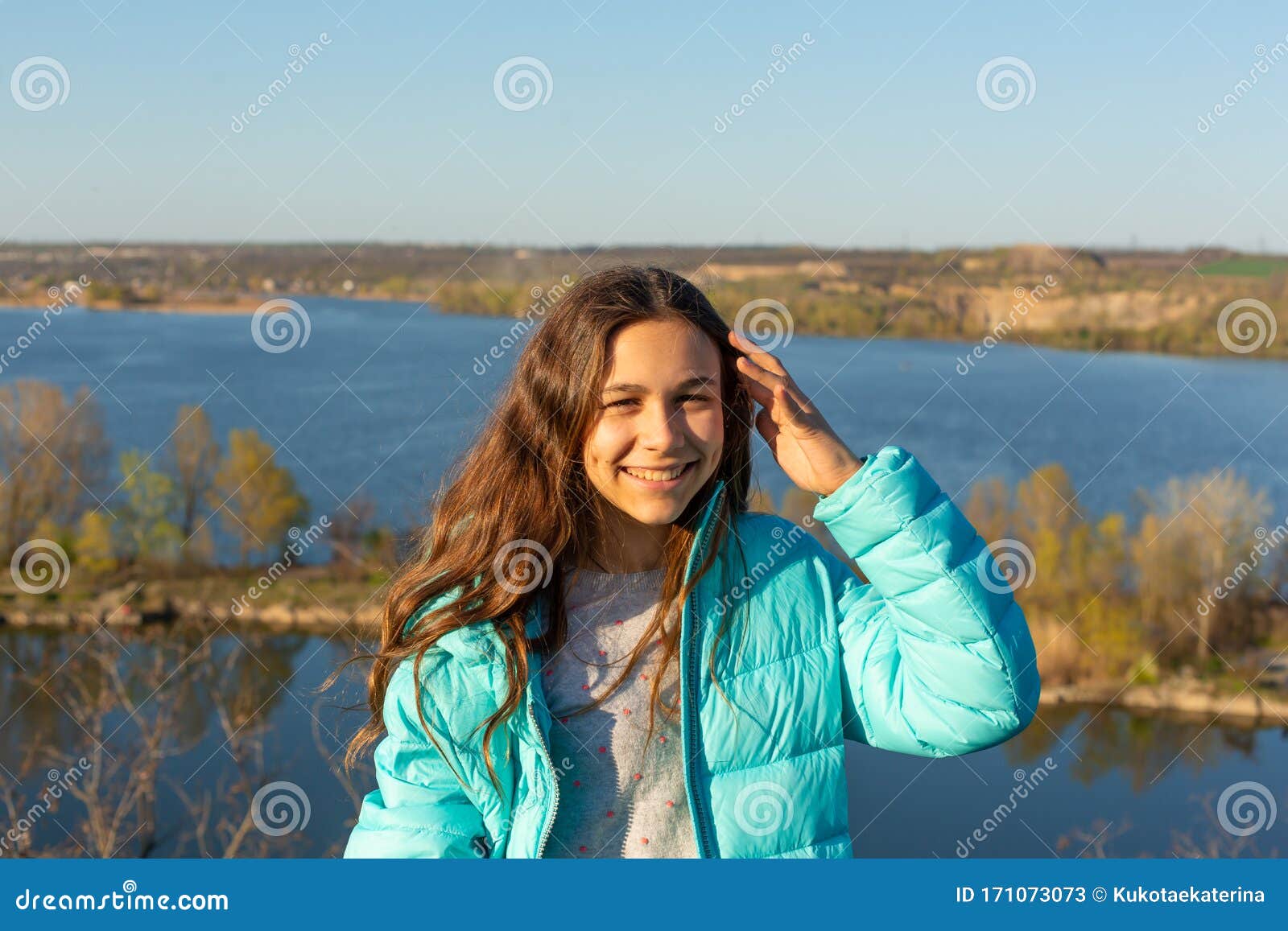 Portrait of a Beautiful Smiling Teen Girl on a Lake Background Stock ... Portrait of a Beautiful Smiling Teen Girl on a Lake Background Stock ...