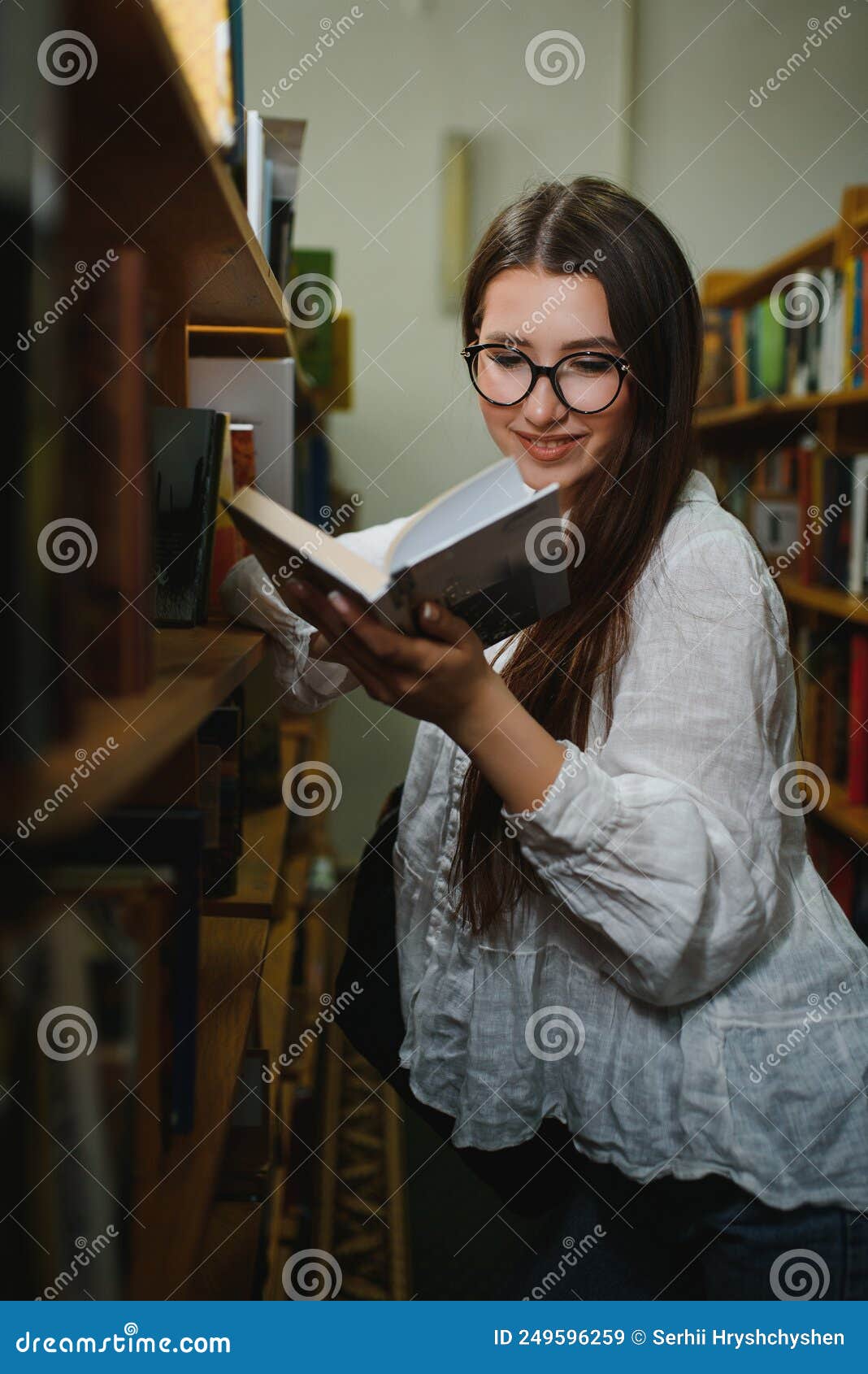 Portrait of a Beautiful Student in a Library Stock Image - Image of ...