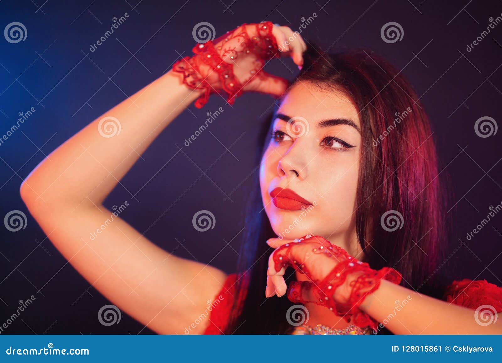 Portrait Of Beautiful Traditional Oriental Belly Dancer Girl Dancing On