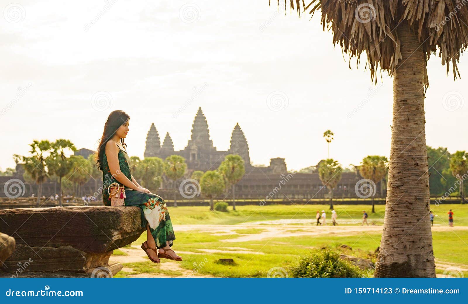 Portrait Of Beautiful Vietnamese Millennial Girl Posing Next To Angkor