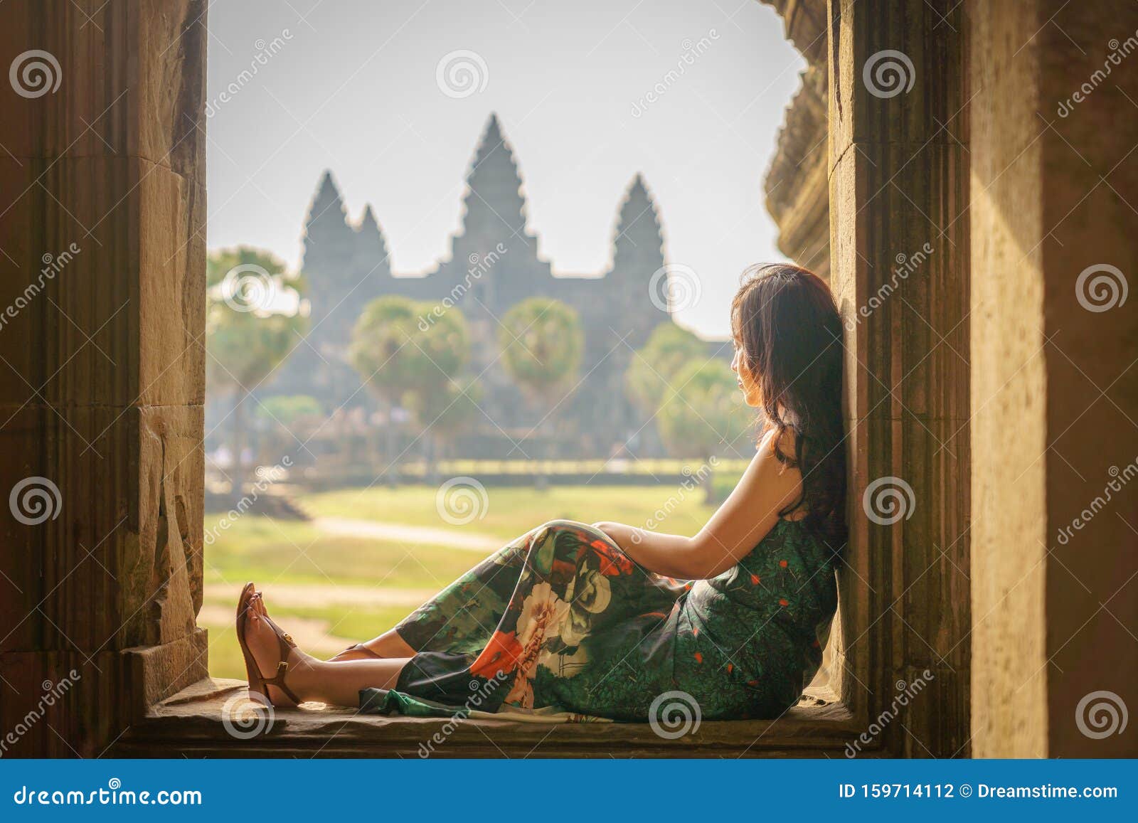 Portrait Of Beautiful Vietnamese Millennial Girl Posing Next To Angkor
