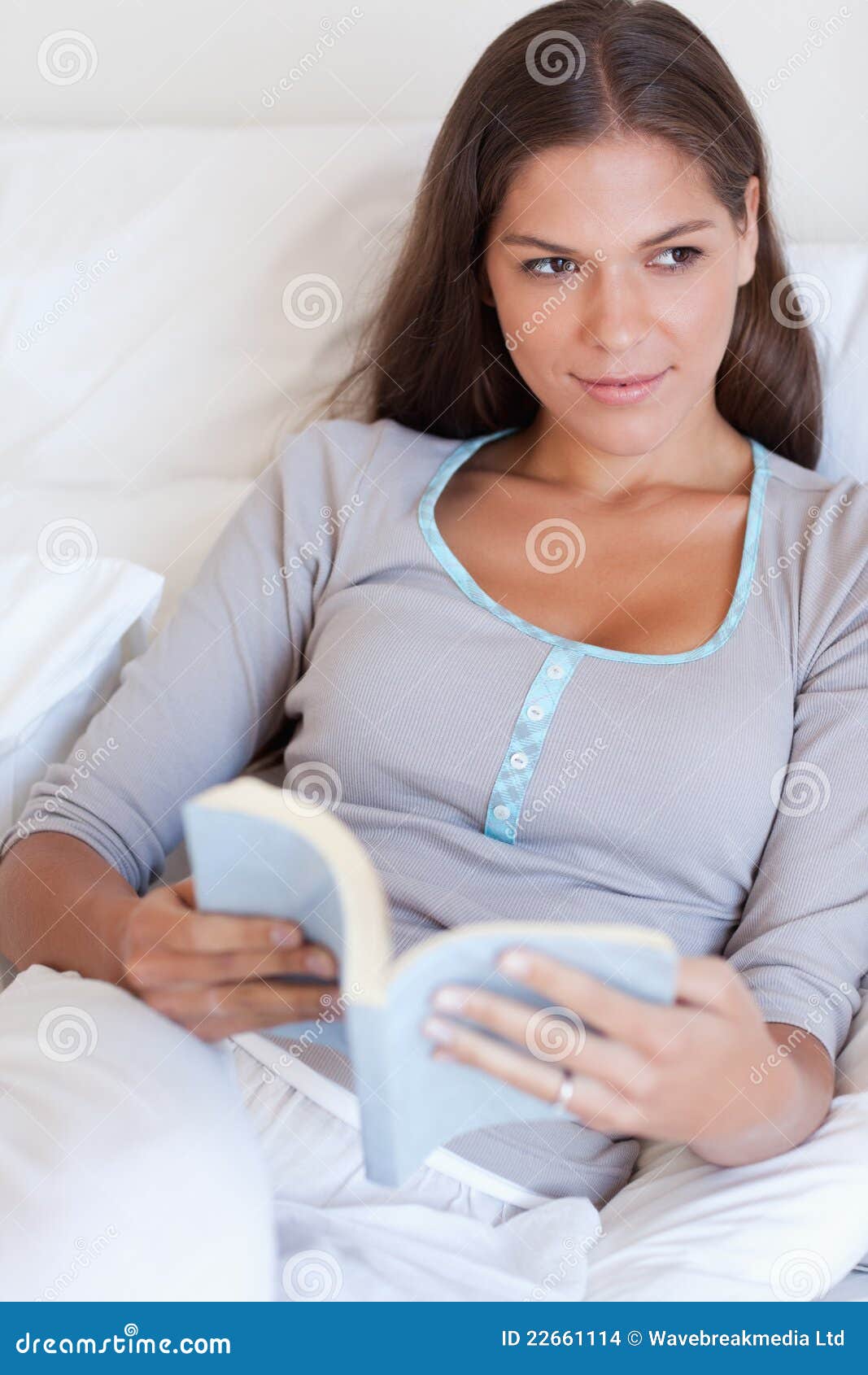 Portrait of a Beautiful Woman Holding a Book Stock Photo - Image of ...