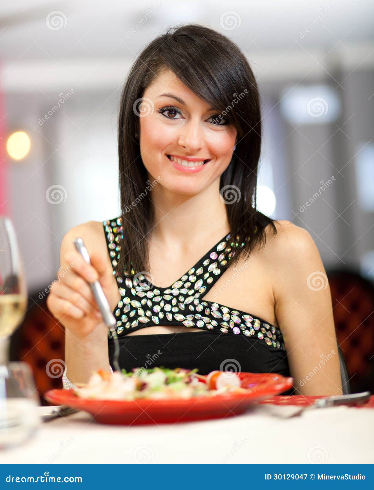 Woman in a restaurant stock image. Image of eating, cellar - 30129047
