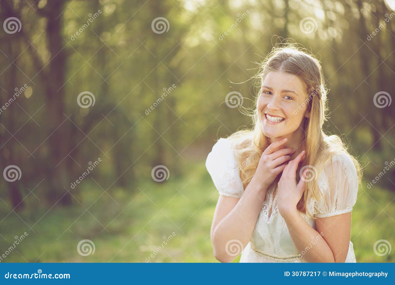Portrait of a Beautiful Woman Smiling Outdoors Stock Image - Image of ...
