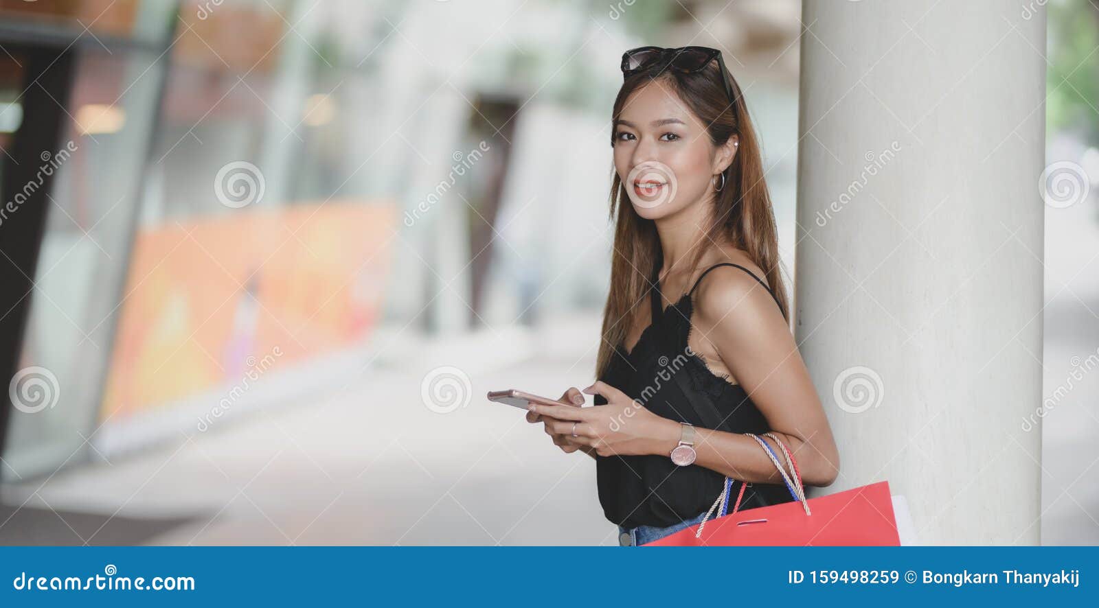 Portrait of Beautiful Woman Smiling To the Camera while Standing ... Portrait of Beautiful Woman Smiling To the Camera while Standing ...