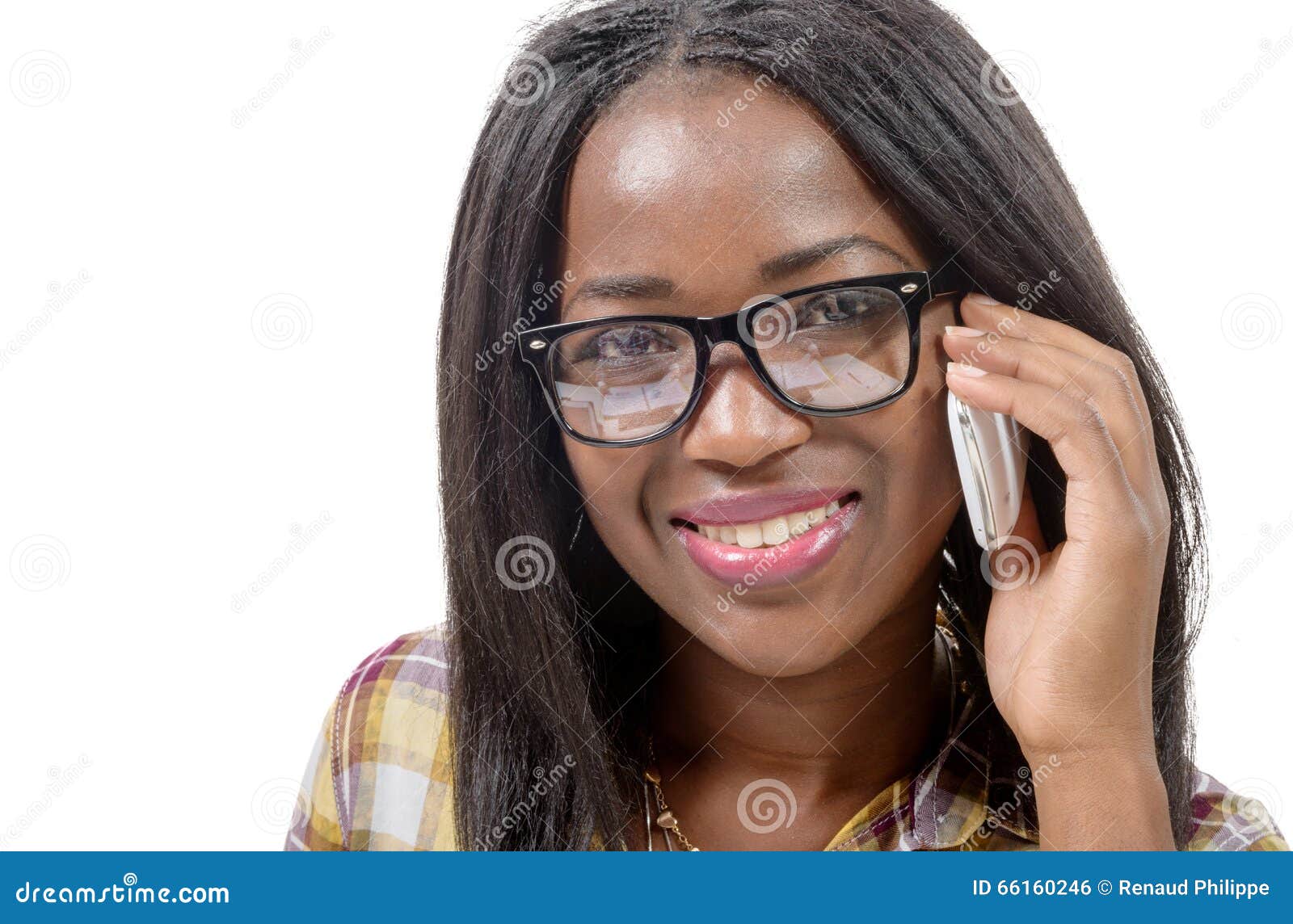 Portrait Of A Beautiful Young African Woman Talking On Cell Phone Stock