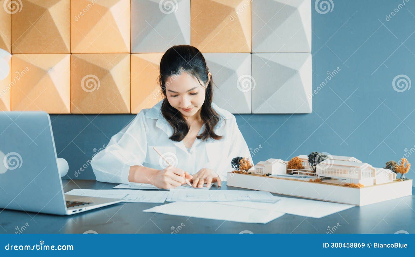 Young Architect Measure House Model while Taking a Note Blueprint ...
