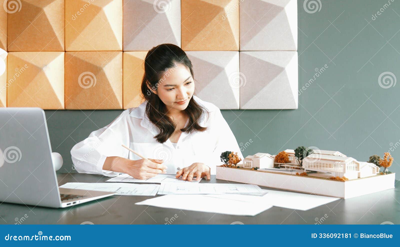Young Architect Measure House Model while Taking a Note Blueprint ...