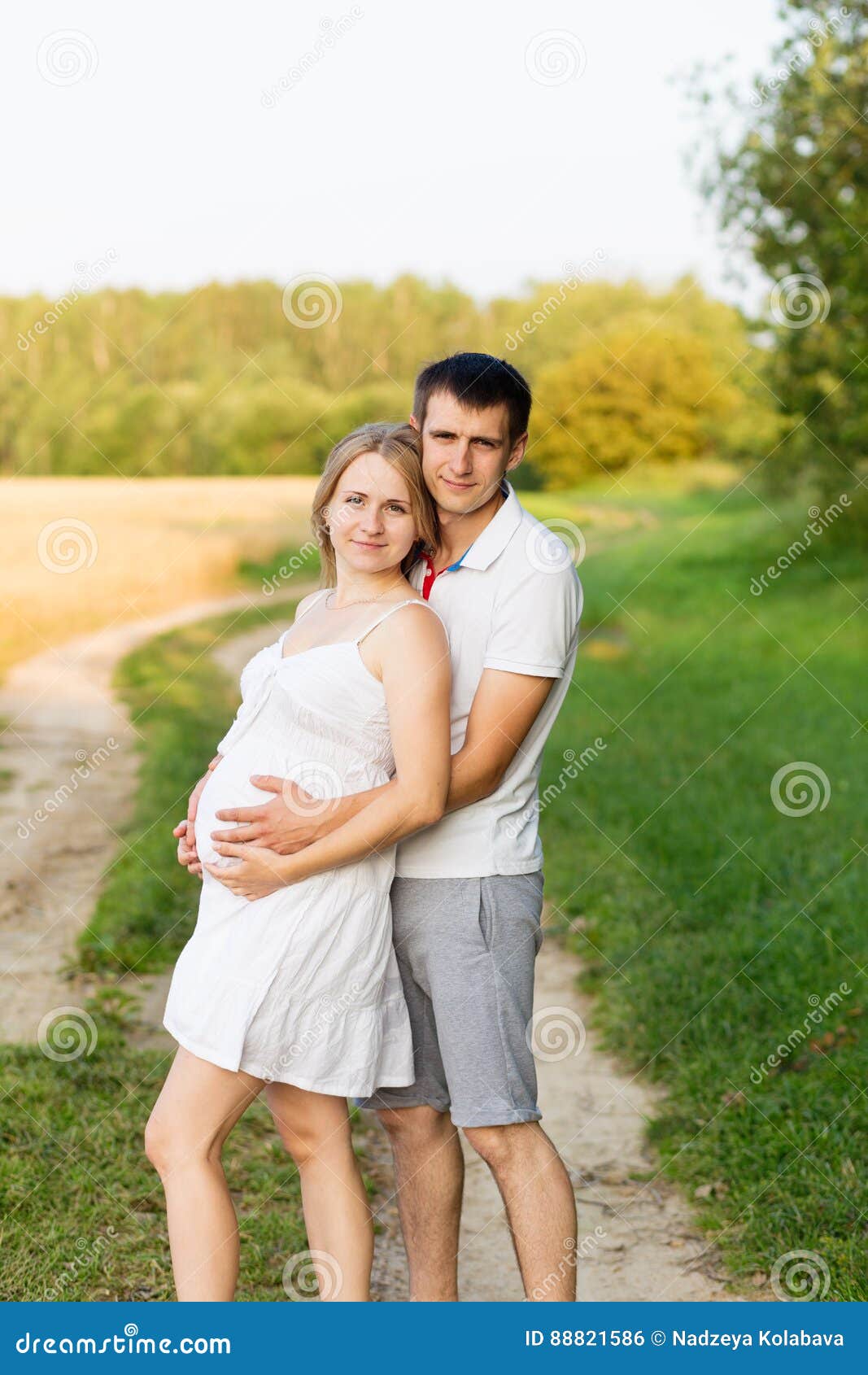 Portrait of Beautiful Young Future Parents Outdoors Stock Photo - Image ...