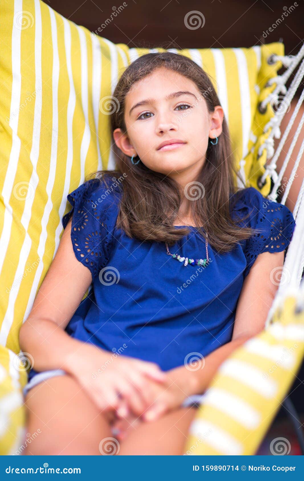 Portrait of a Happy Young Hispanic Girl Smiling. Stock Photo - Image of ... Portrait of a Happy Young Hispanic Girl Smiling. Stock Photo - Image of ...
