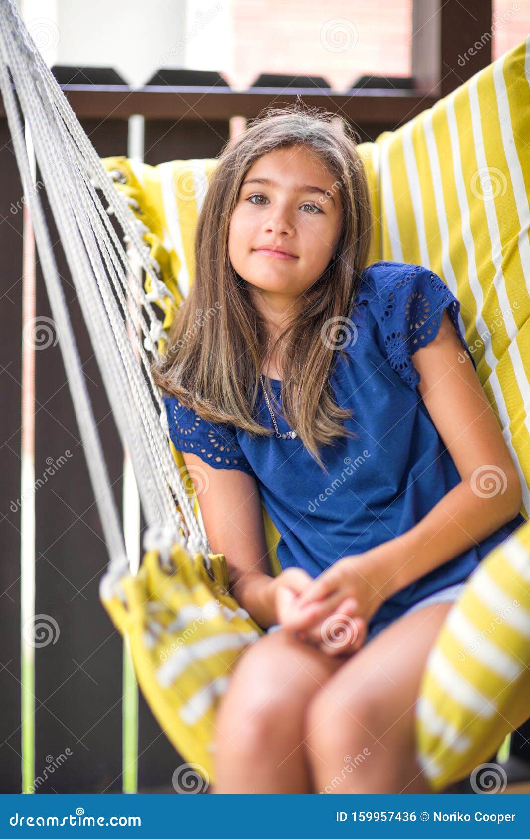 Portrait of a Happy Young Hispanic Girl Smiling. Stock Photo - Image of ... Portrait of a Happy Young Hispanic Girl Smiling. Stock Photo - Image of ...