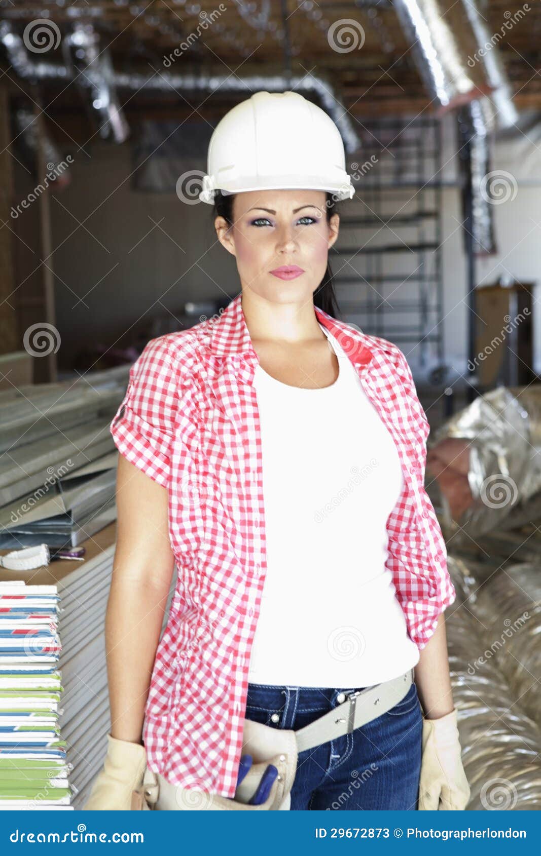 Portrait Of Beautiful Young Woman Architect Wearing Hardhat At ... Portrait Of Beautiful Young Woman Architect Wearing Hardhat At ...
