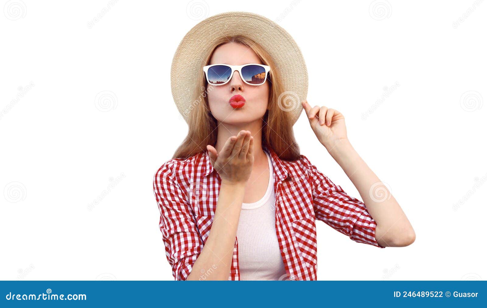 Portrait Of Beautiful Young Woman Blowing Her Red Lips Sending Sweet