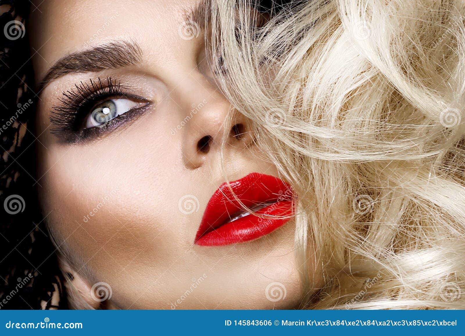 Portrait Of A Beautiful Young Woman With Perfect Makeup Red Lips And