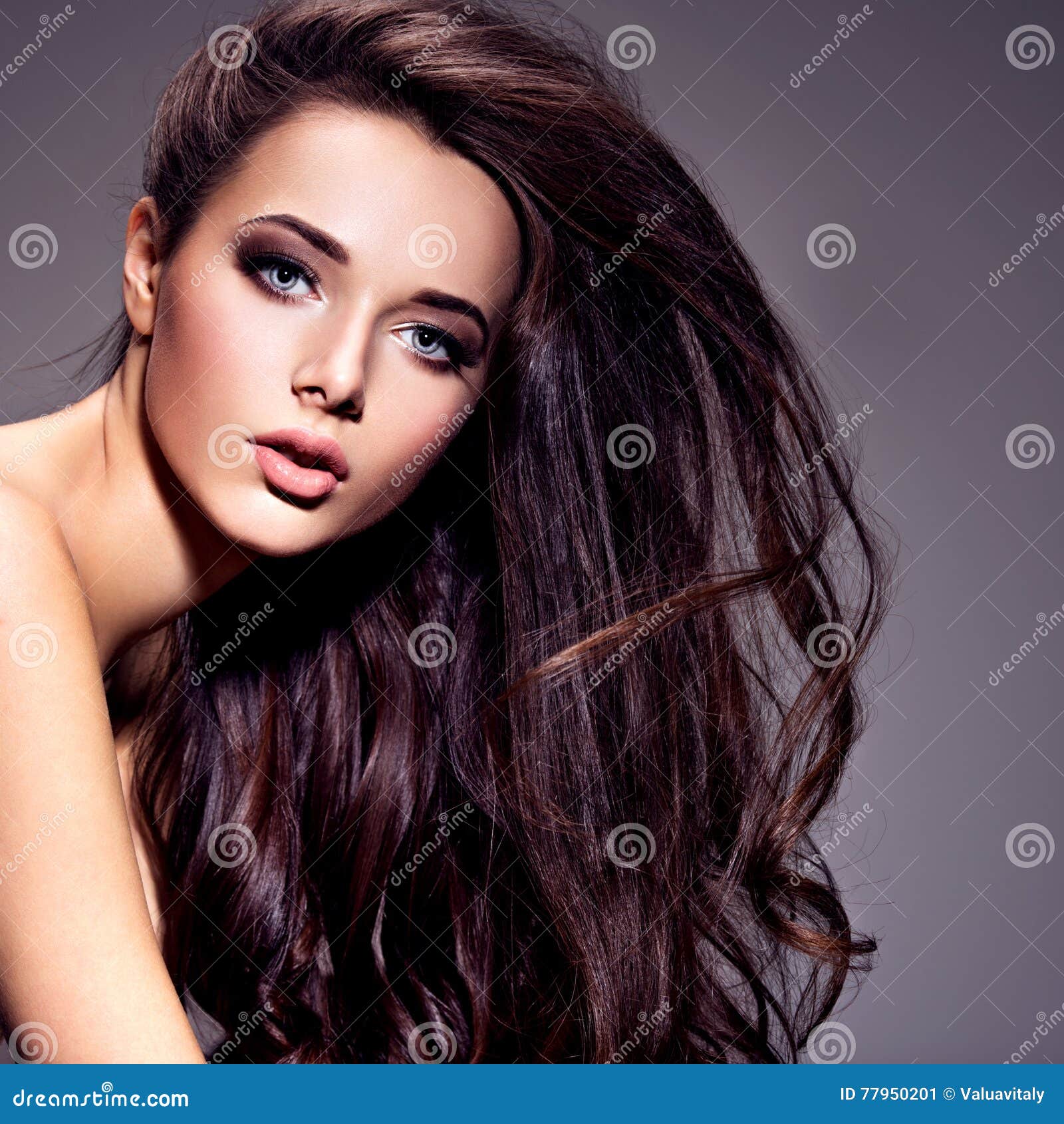 Portrait Of The Beautiful Young Woman With Long Brown Hair Stock Image
