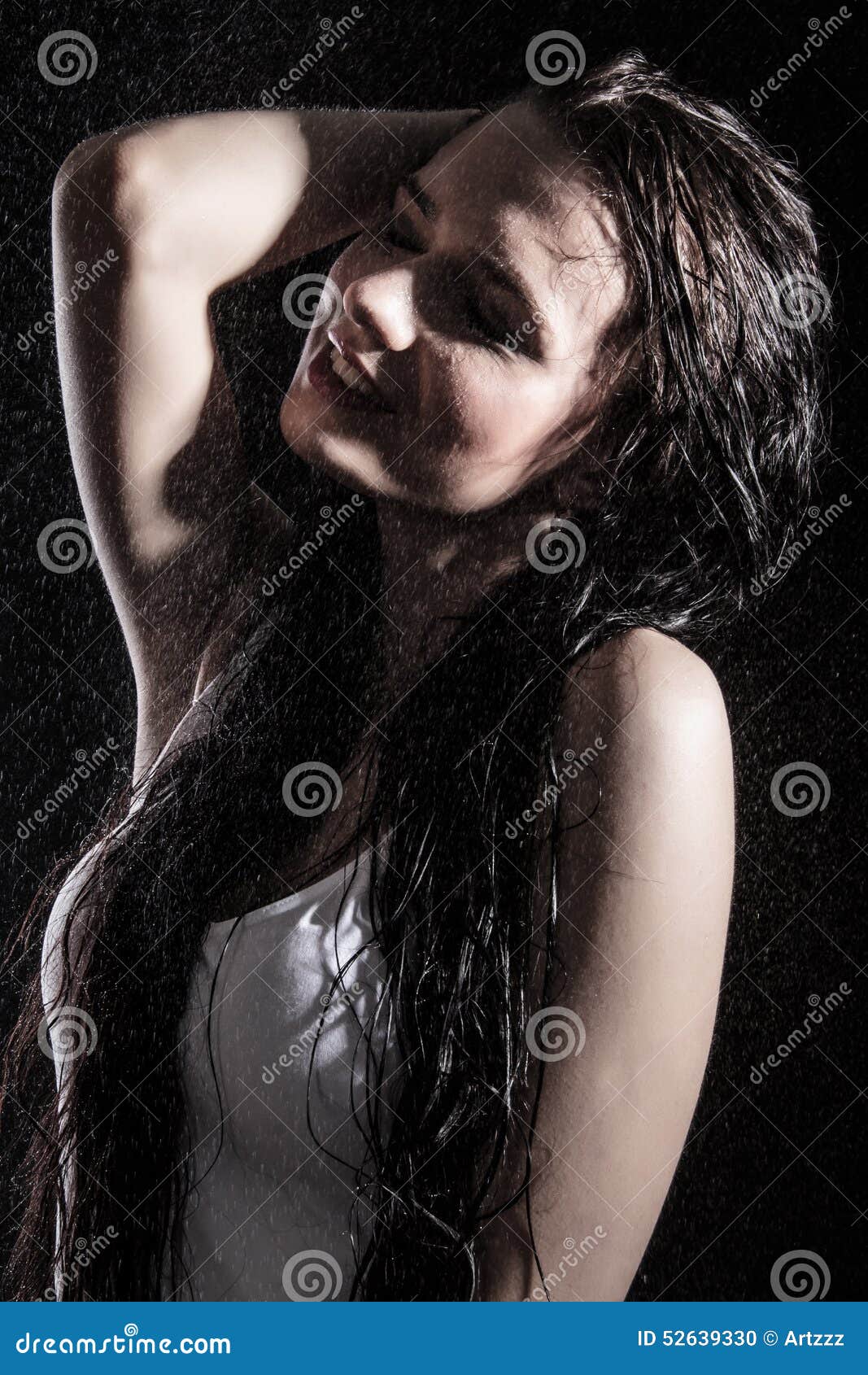 Portrait Of A Beautiful Young Woman Staying Under Water Splashes Stock
