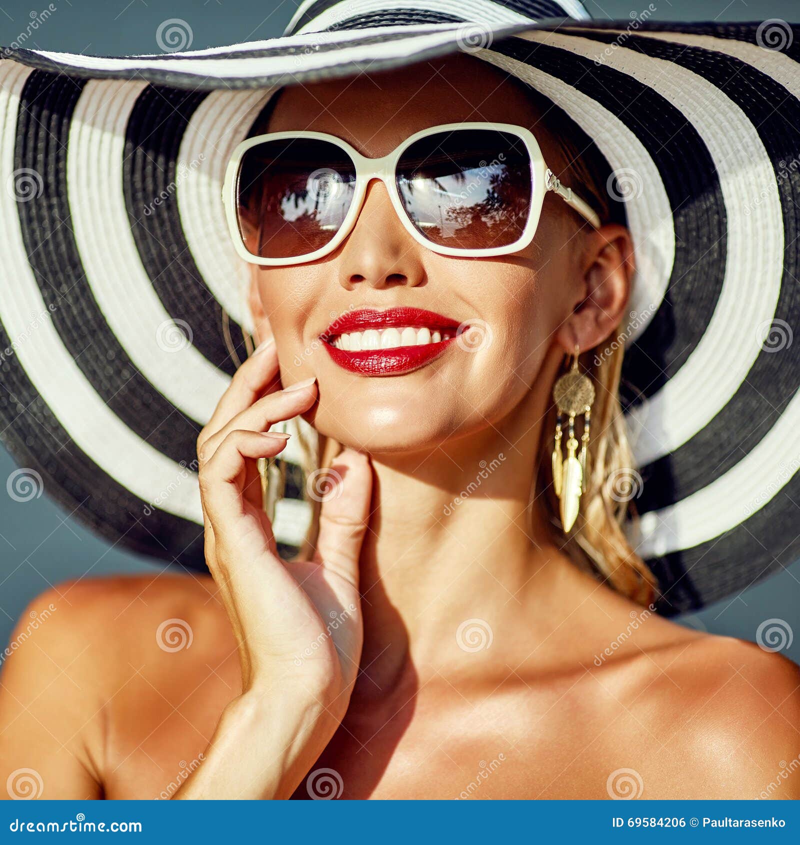 Portrait of a Beautiful Young Woman Wearing Hat and Sunglasses - Stock ... Portrait of a Beautiful Young Woman Wearing Hat and Sunglasses - Stock ...