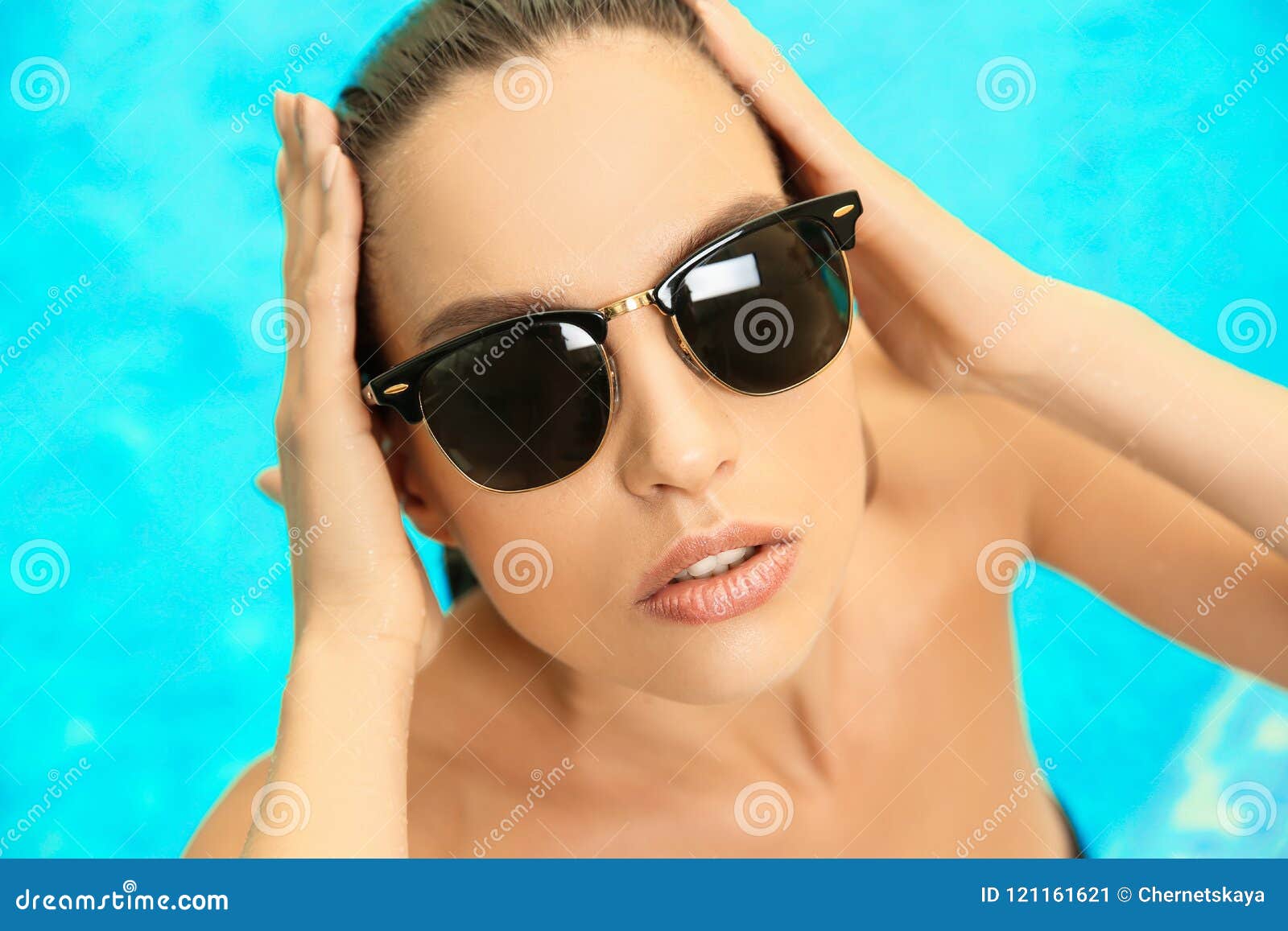 Portrait Of Beautiful Young Woman Wearing Sunglasses Stock Image