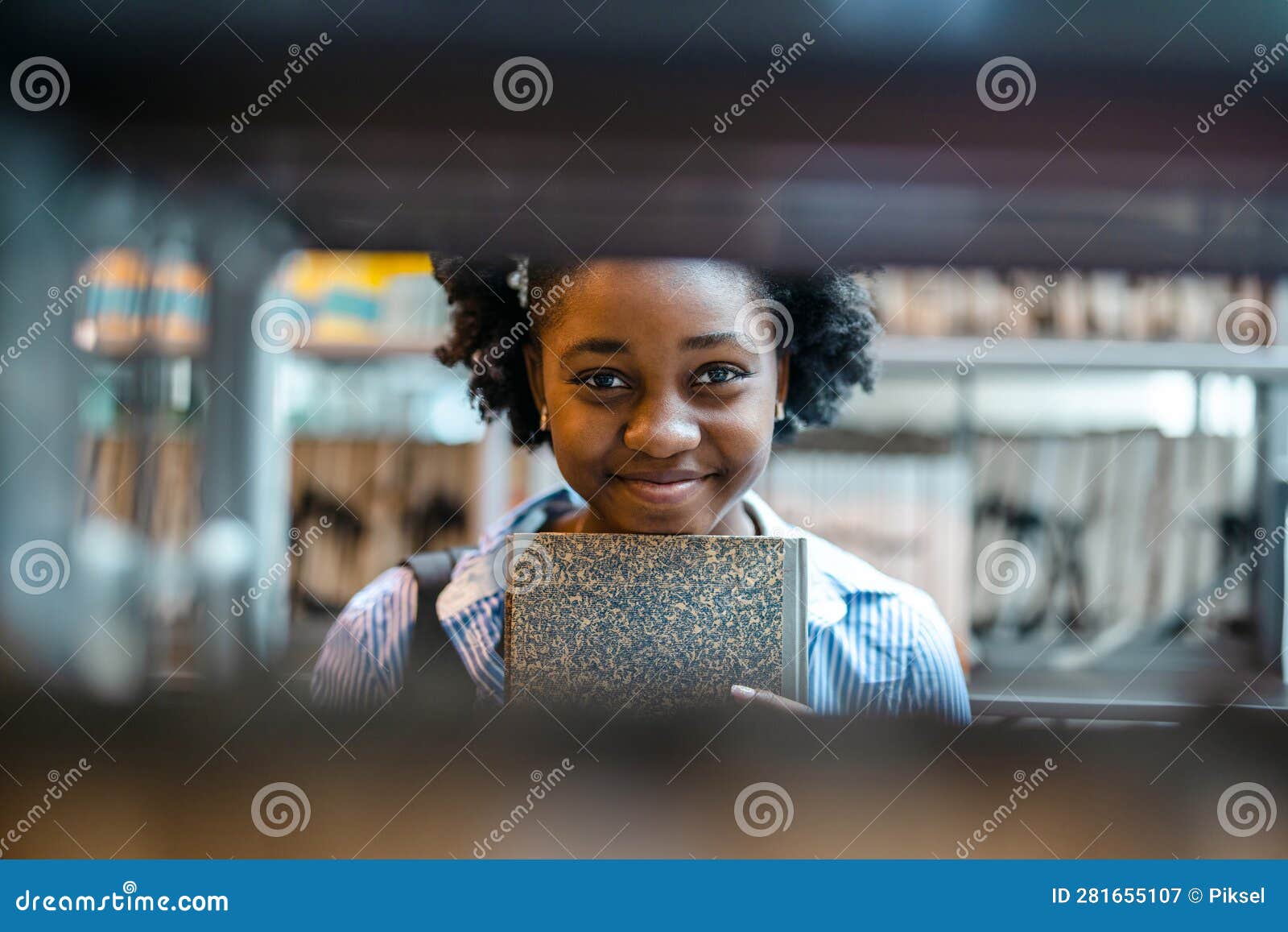 Black Female Student Standing in a Library Stock Image - Image of ...