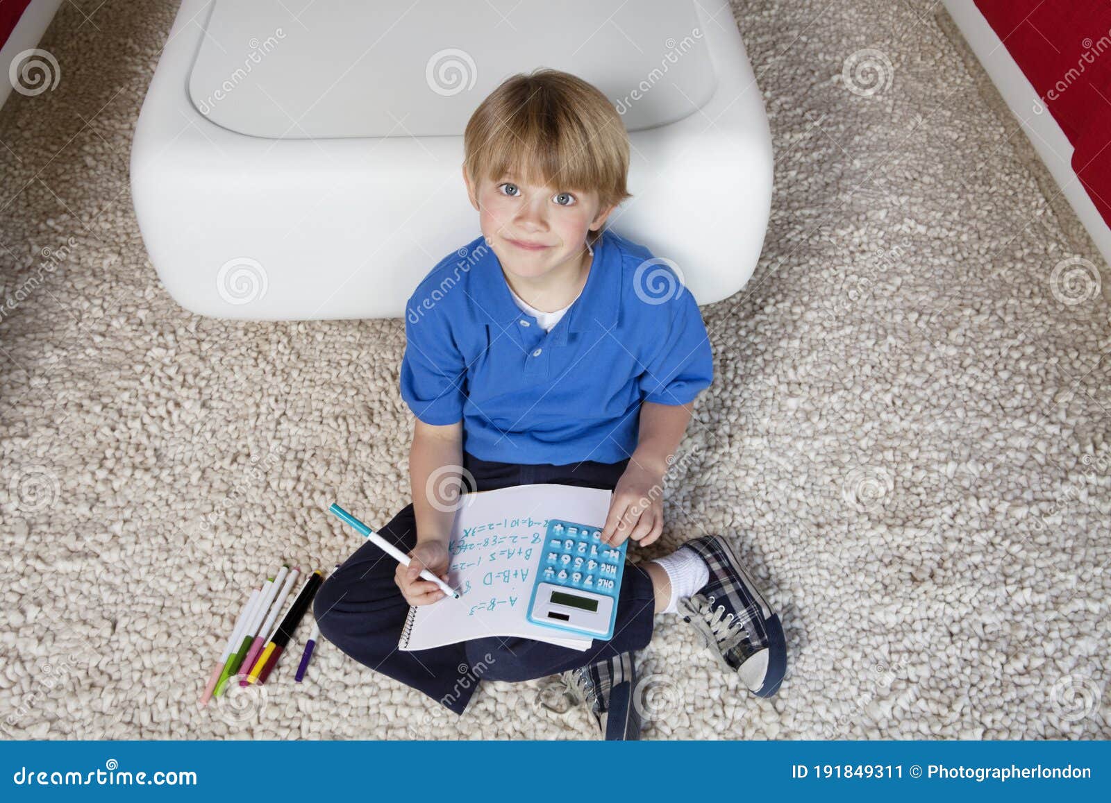 Portrait of a Blond Boy Sitting Near Sofa Doing Homework Stock Image ... Portrait of a Blond Boy Sitting Near Sofa Doing Homework Stock Image ...