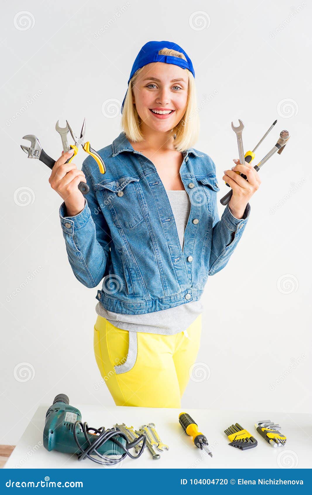 Girl with tools stock photo. Image of house, apartment - 104004720