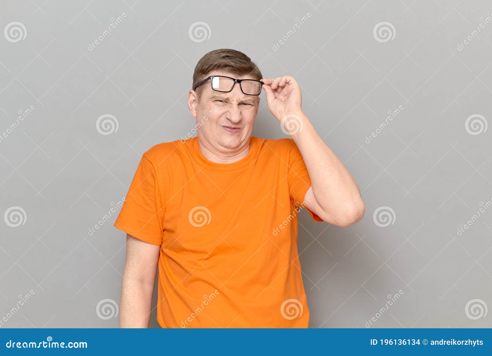 Portrait of Blond Mature Man Wincing and Grimacing from Disgust Stock ... Portrait of Blond Mature Man Wincing and Grimacing from Disgust Stock ...
