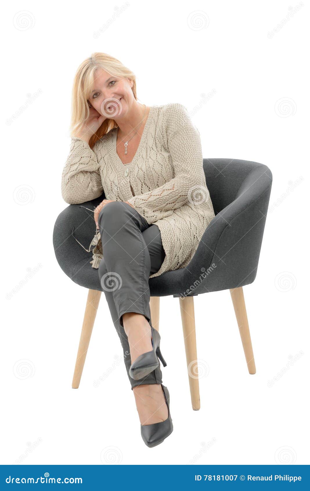 Portrait of Blond Mature Woman Relaxing in Armchair Stock Image - Image ... Portrait of Blond Mature Woman Relaxing in Armchair Stock Image - Image ...