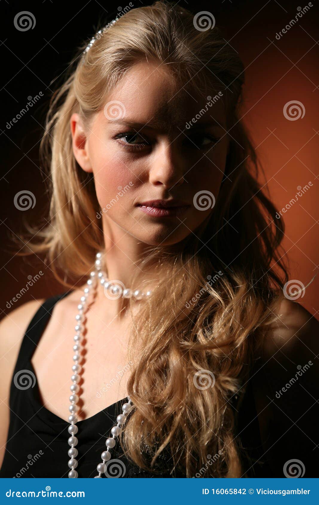Portrait of a Blonde Lady in Dark Colours Stock Photo - Image of eyes ...