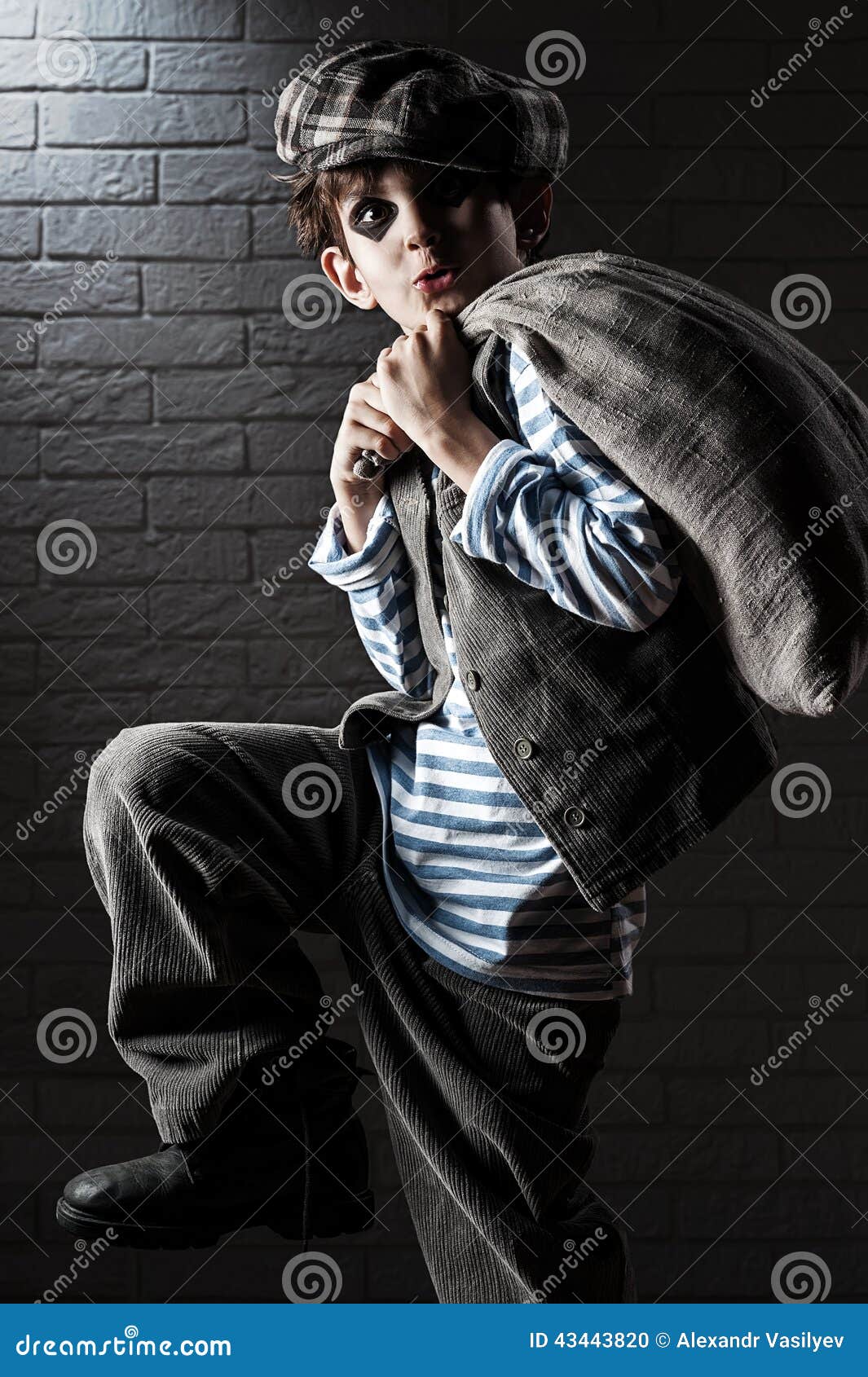 Portrait of a Boy with a Bag Thief Stock Photo - Image of vertical ...