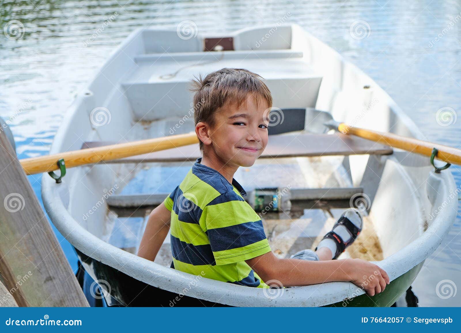 Portrait of a Boy in a Boat Stock Image - Image of rower, rowing: 76642057