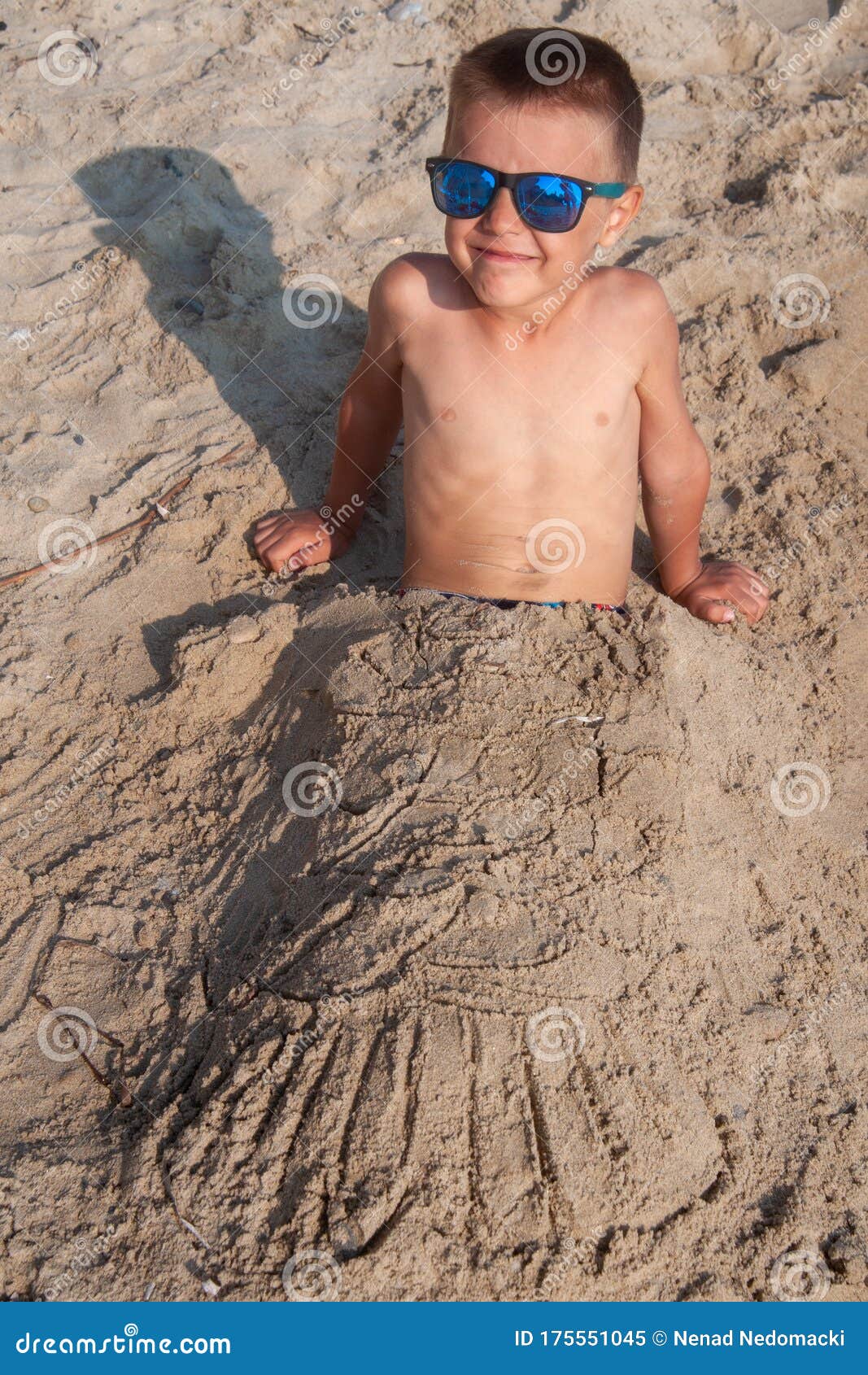 Portrait of a Boy Buried in Sand Stock Image - Image of child ...