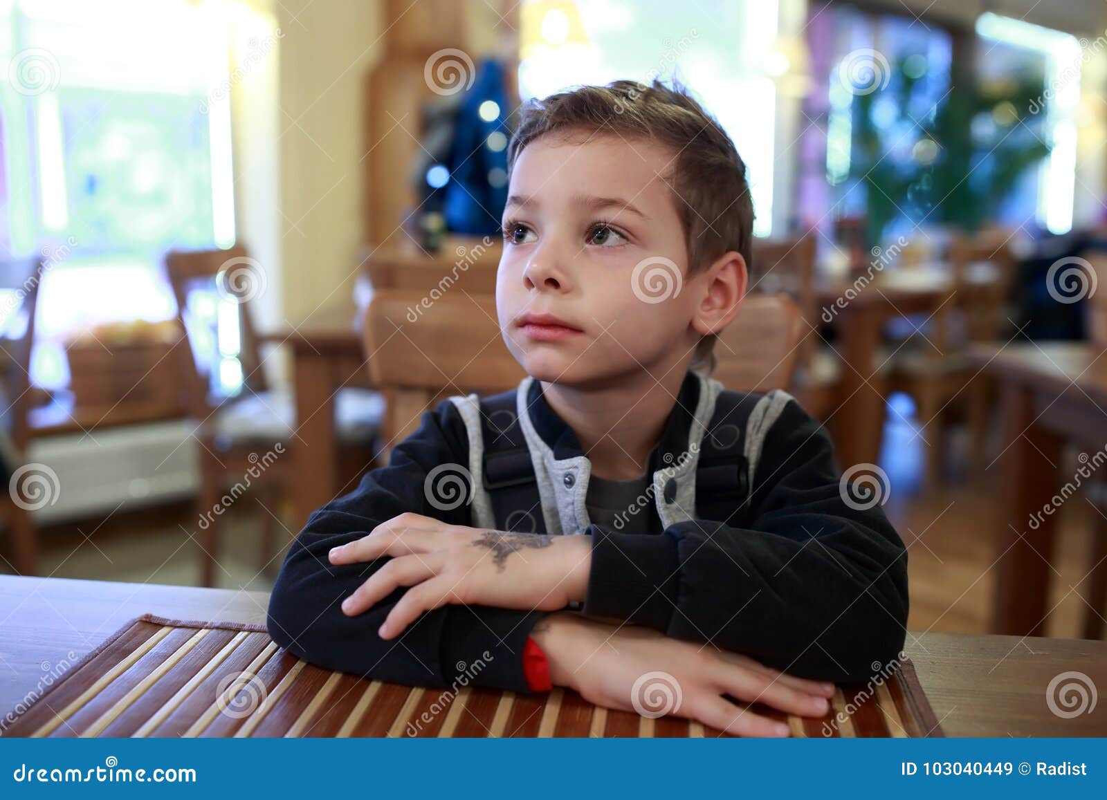 Boy in cafe stock image. Image of cafe, breakfast, face - 103040449