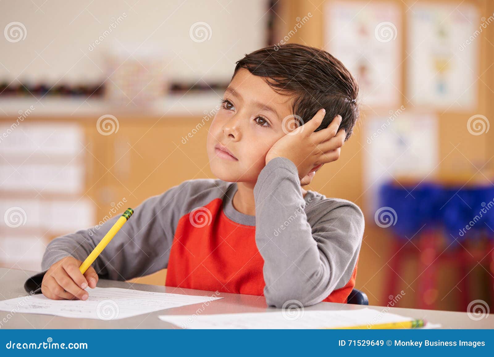 Portrait of a Boy Daydreaming in an Elementary School Class Stock Image ...