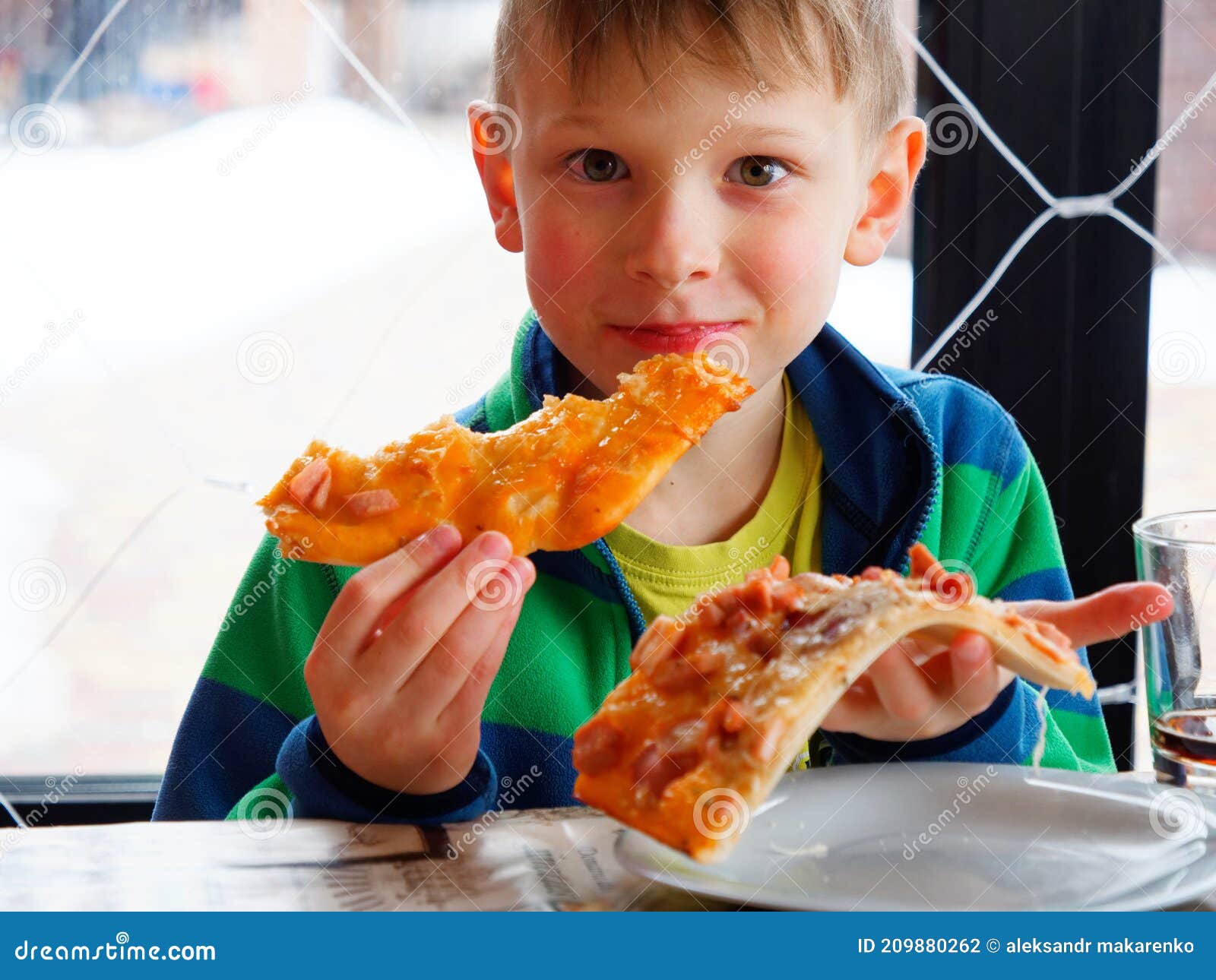 Portrait of a Boy Greedily Eating Pizza Stock Photo - Image of happy ...