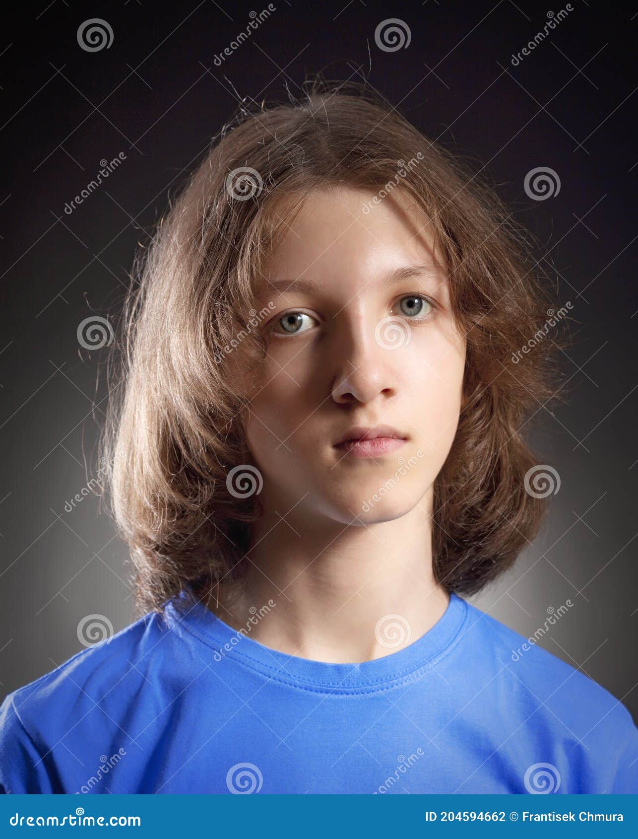 Portrait of a Boy with Long Hair in Blue Top Stock Photo - Image of ...