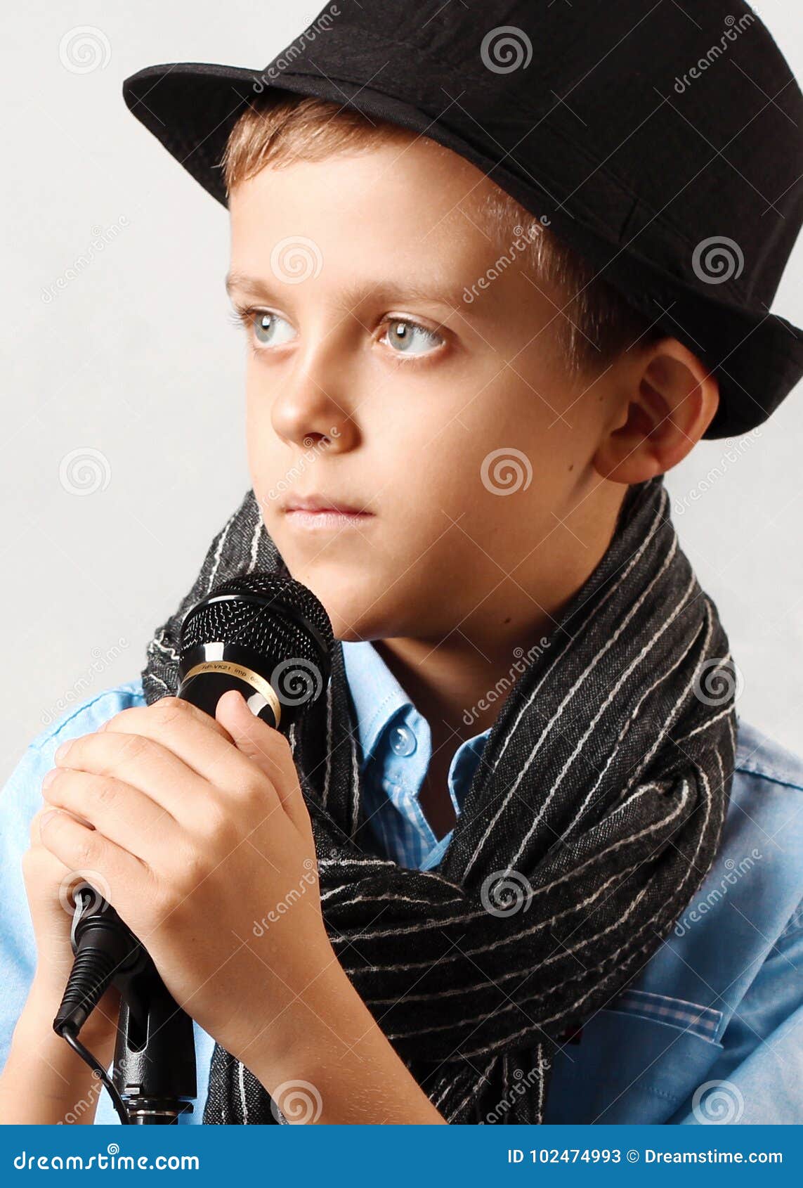 Portrait of a Boy with a Microphone Stock Image - Image of microphone ...