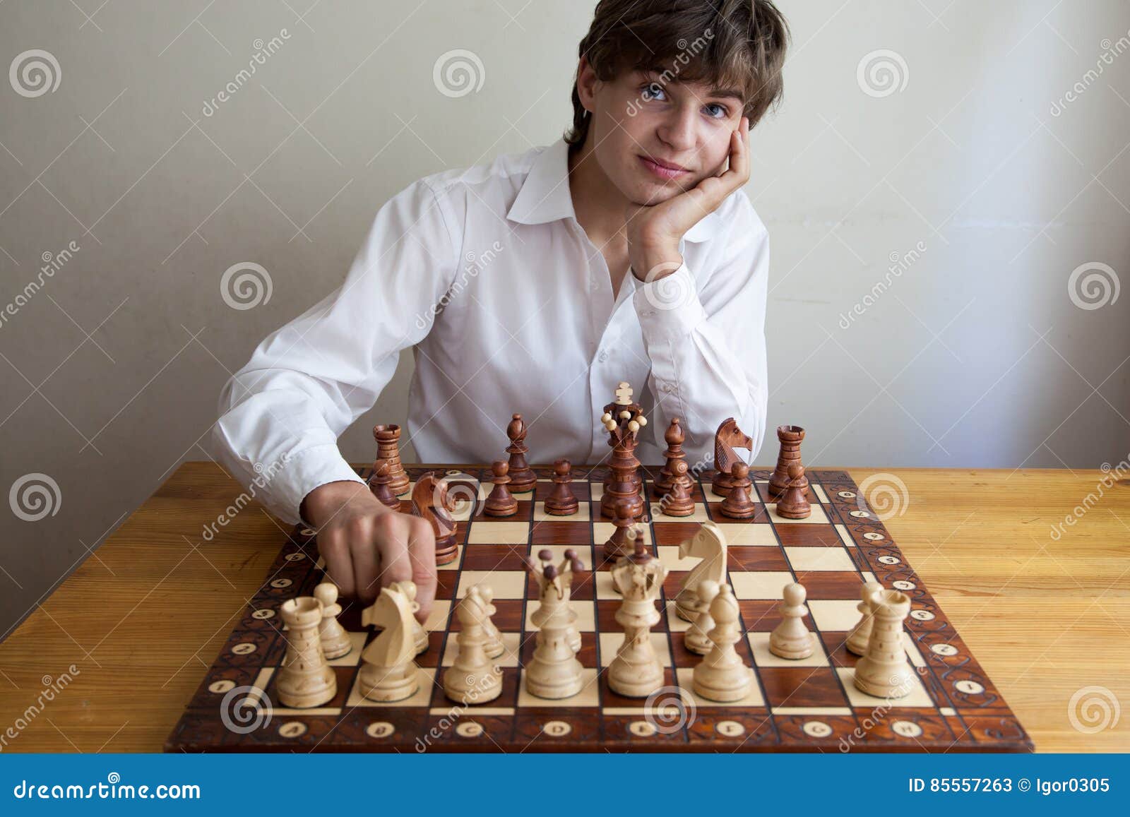 Portrait of a Boy Playing Chess Stock Image - Image of blond, indoors ...