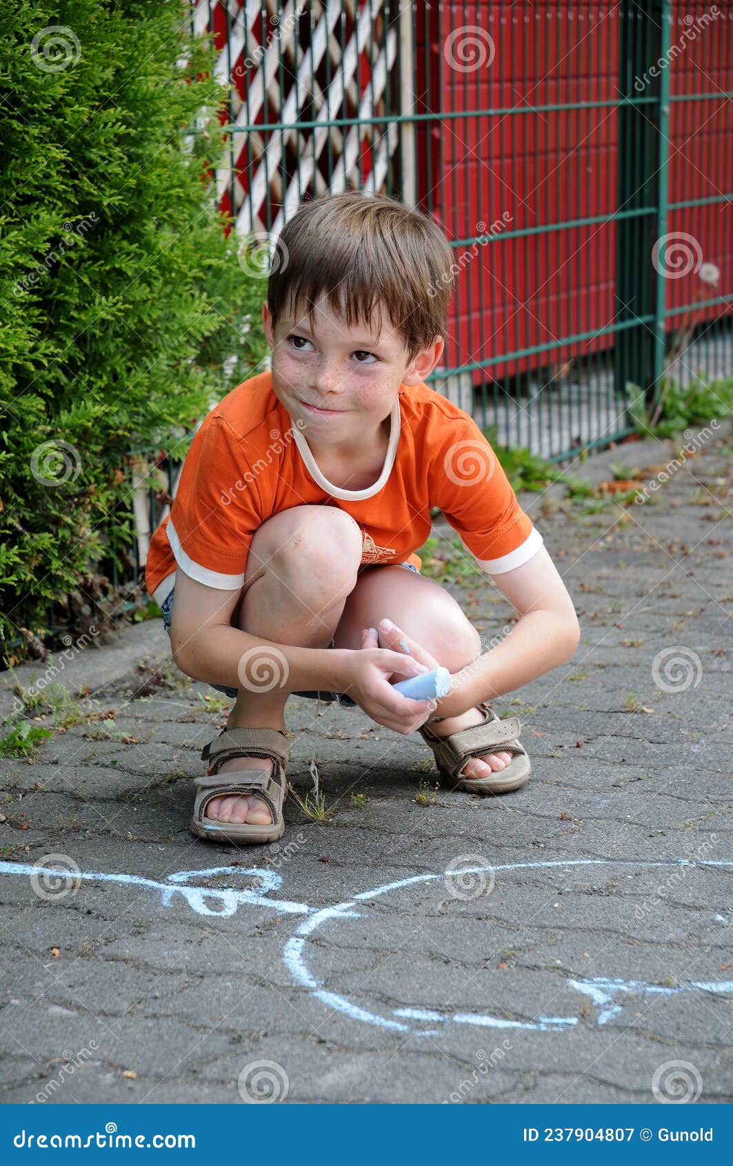 Scalawag Chalking the Street Stock Image - Image of play, child: 237904807