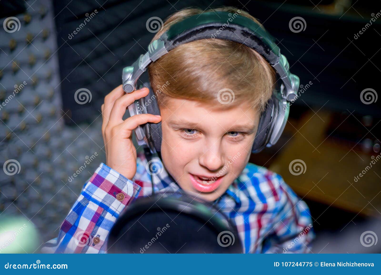 Boy in a recording studio stock image. Image of board - 107244775