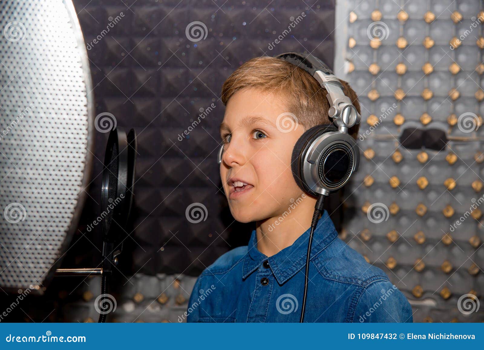 Boy in a recording studio stock photo. Image of panel - 109847432