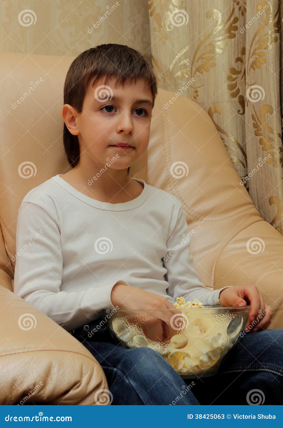Portrait of a Boy Sitting on a Chair with Popcorn Stock Image - Image ...