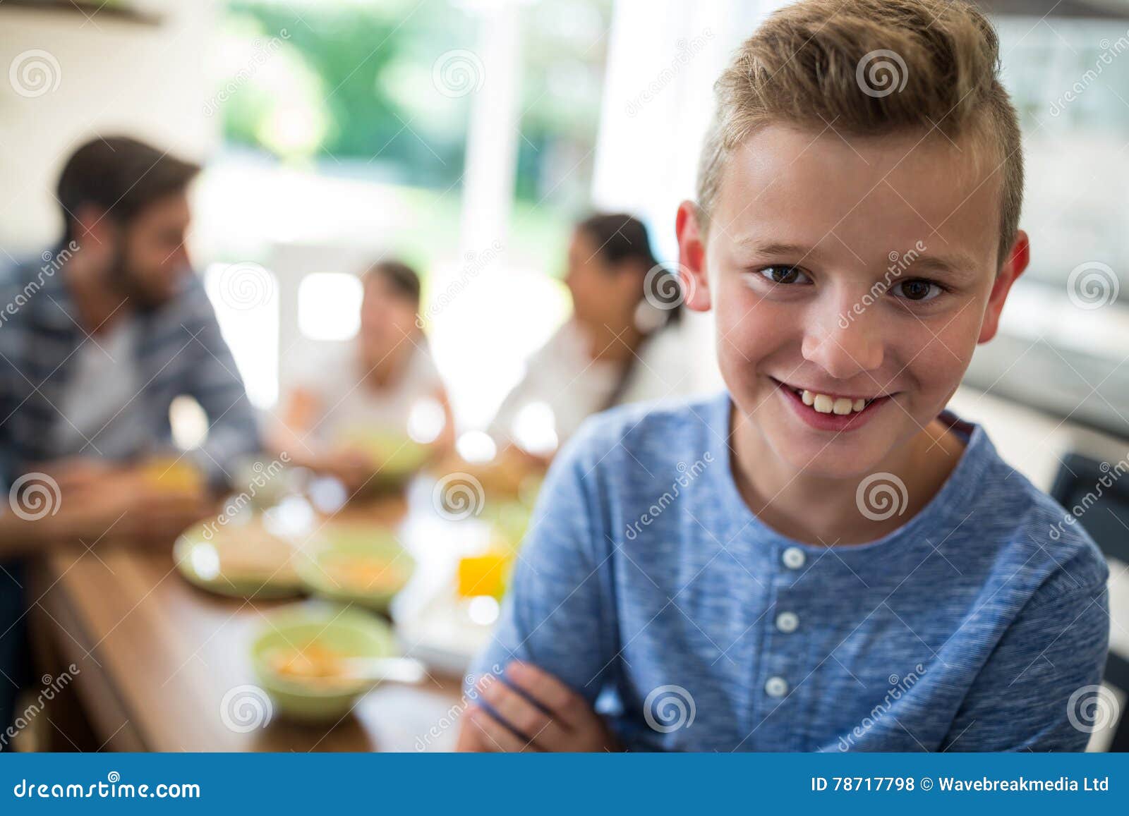 Portrait of Boy Sitting on Dining Table Stock Photo - Image of casual ...