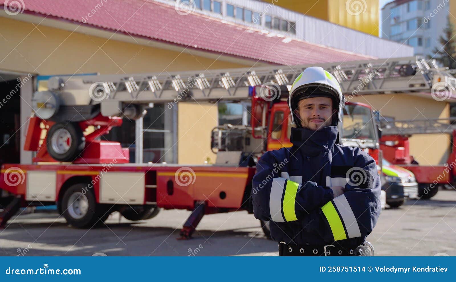 Portrait of Brave Fireman with Helmet Near Fire Engine. Firefighter ...